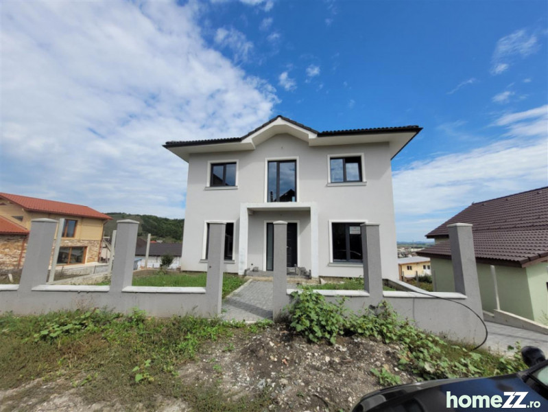 Casa individuala cu garaj subteran in Campenesti, 198.000 eur - HomeZZ.ro